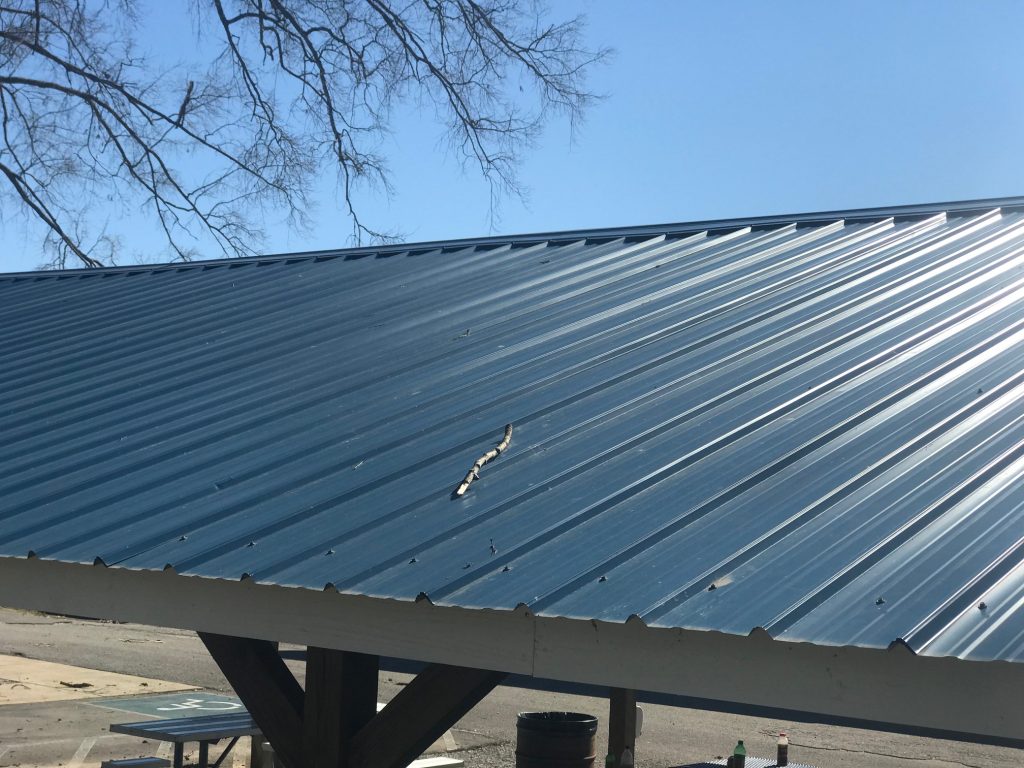 The Amish Install Metal Roofing And Metal Siding - Amish of Ethridge